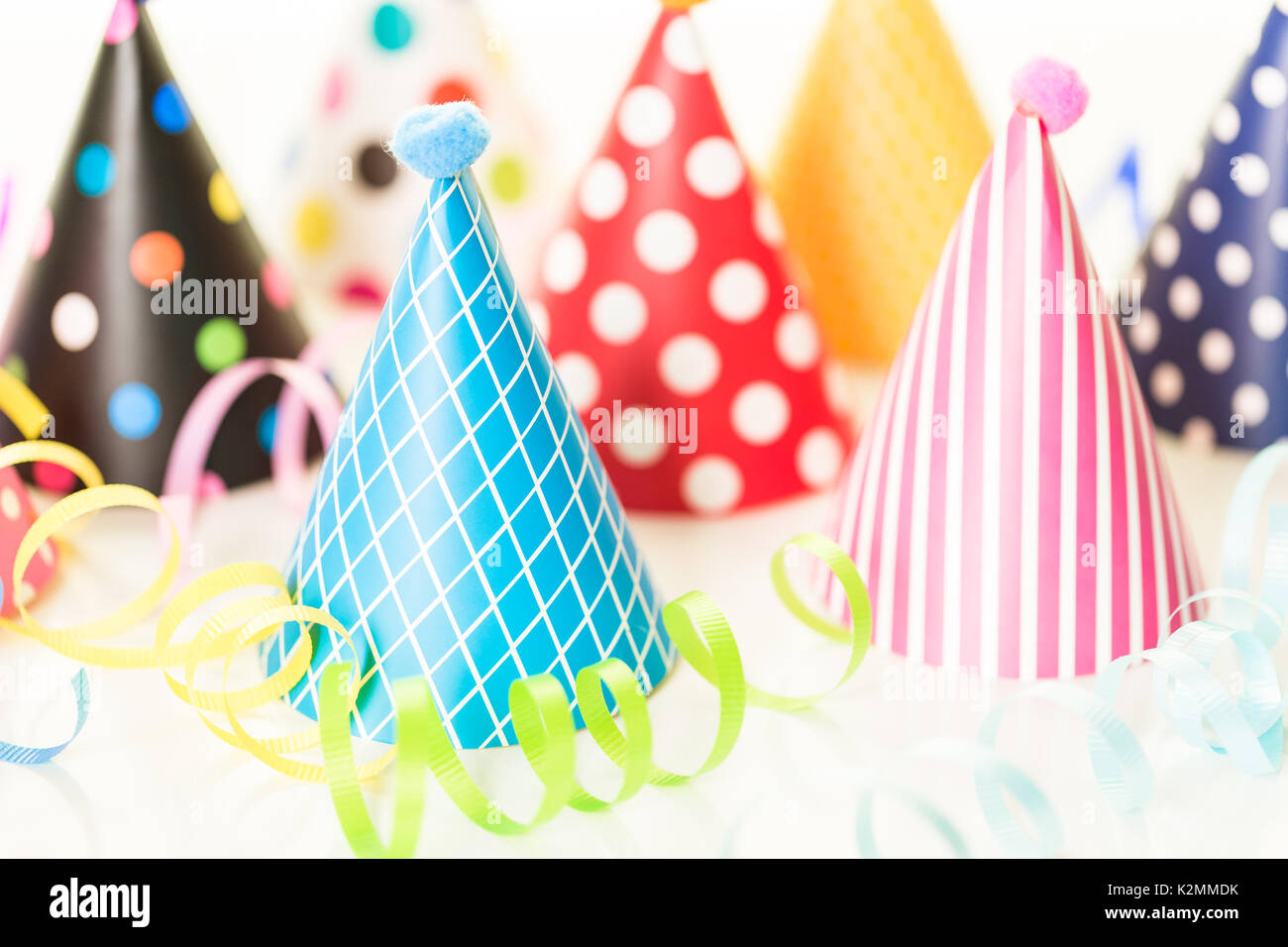 Colorful party hats for kids Birthday Party Stock Photo - Alamy