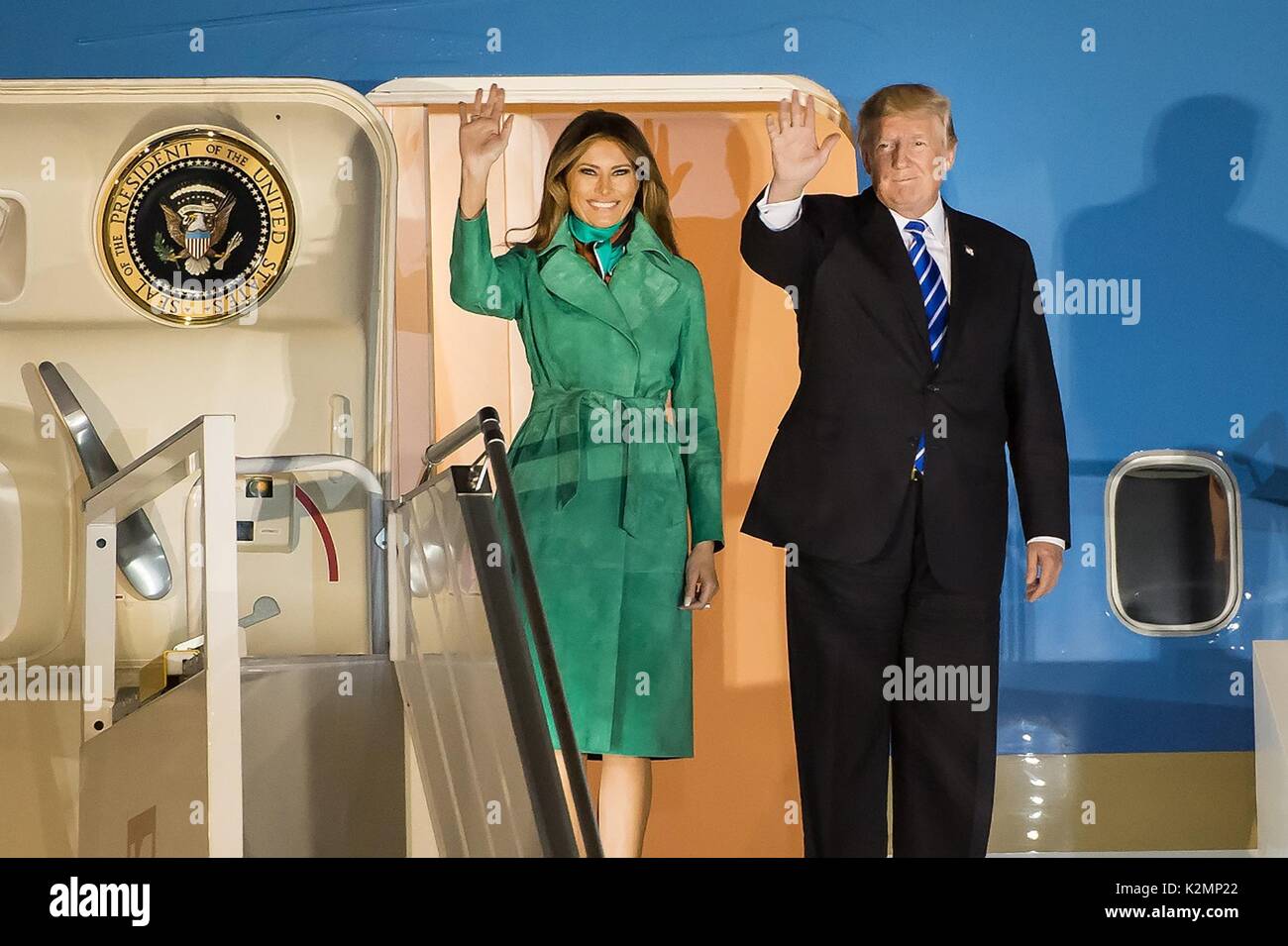U.S. President Donald Trump and First Lady Melania Trump wave as they ...