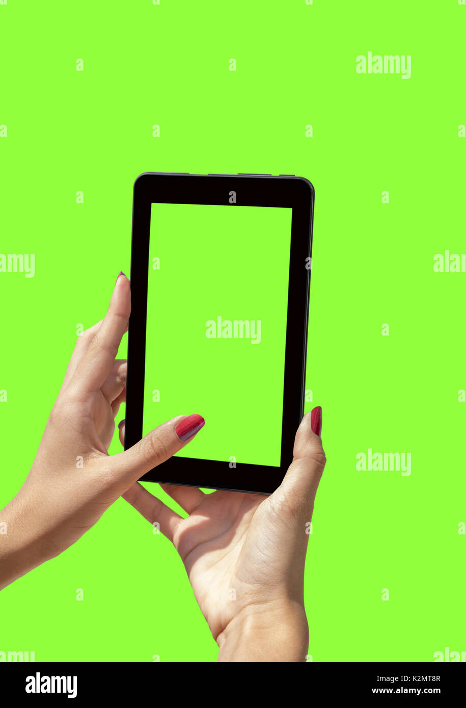 Young girl hand holding a tablet on green screen Stock Photo - Alamy