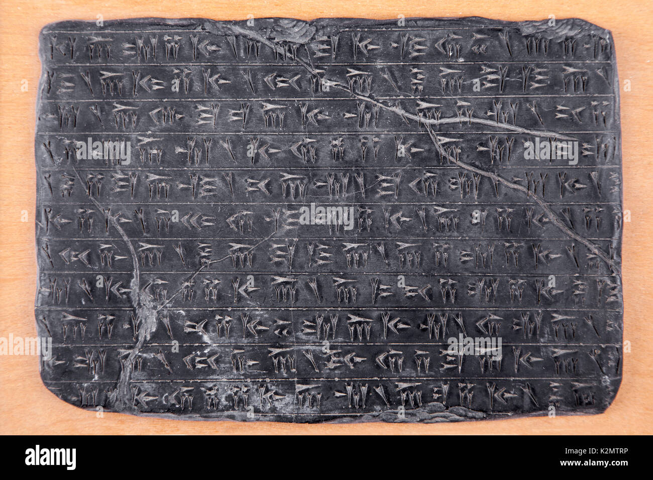 Cuneiform script. Babylonian stone with cuneiform writing isolated on ...