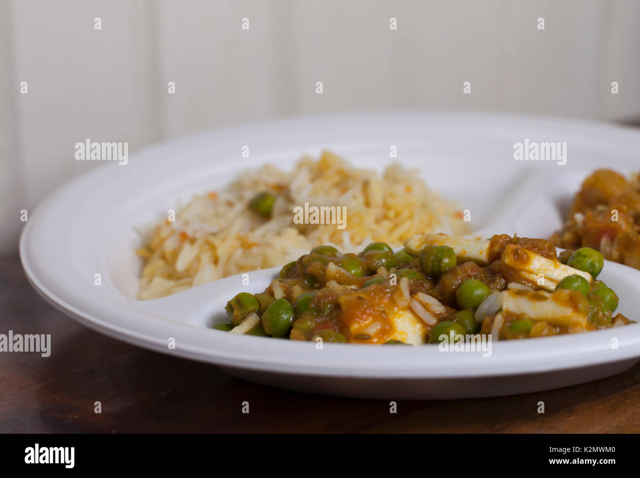 Close up of matar paneer with rice and chickpeas Stock Photo - Alamy