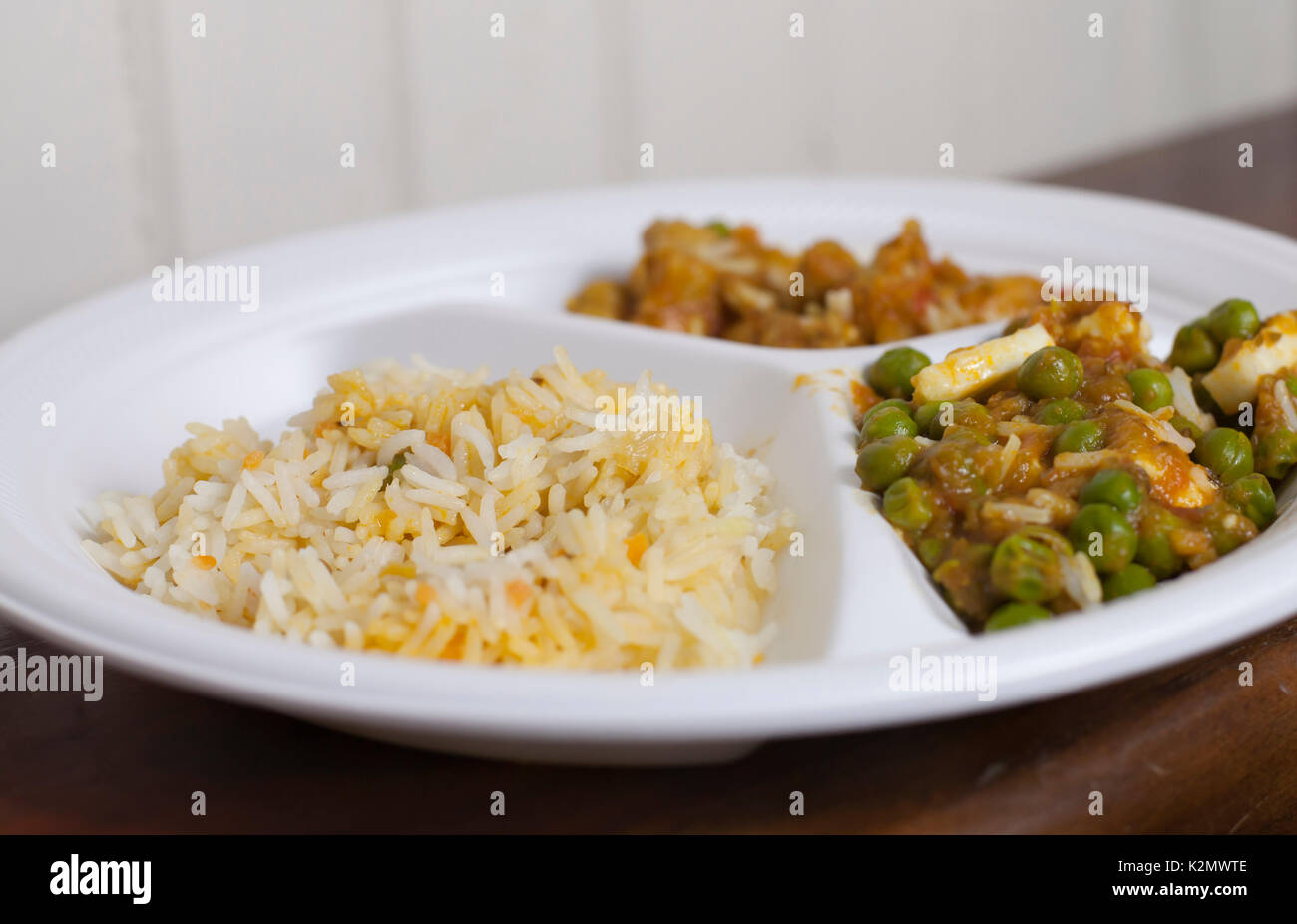 Close up of matar paneer with rice and chickpeas Stock Photo - Alamy