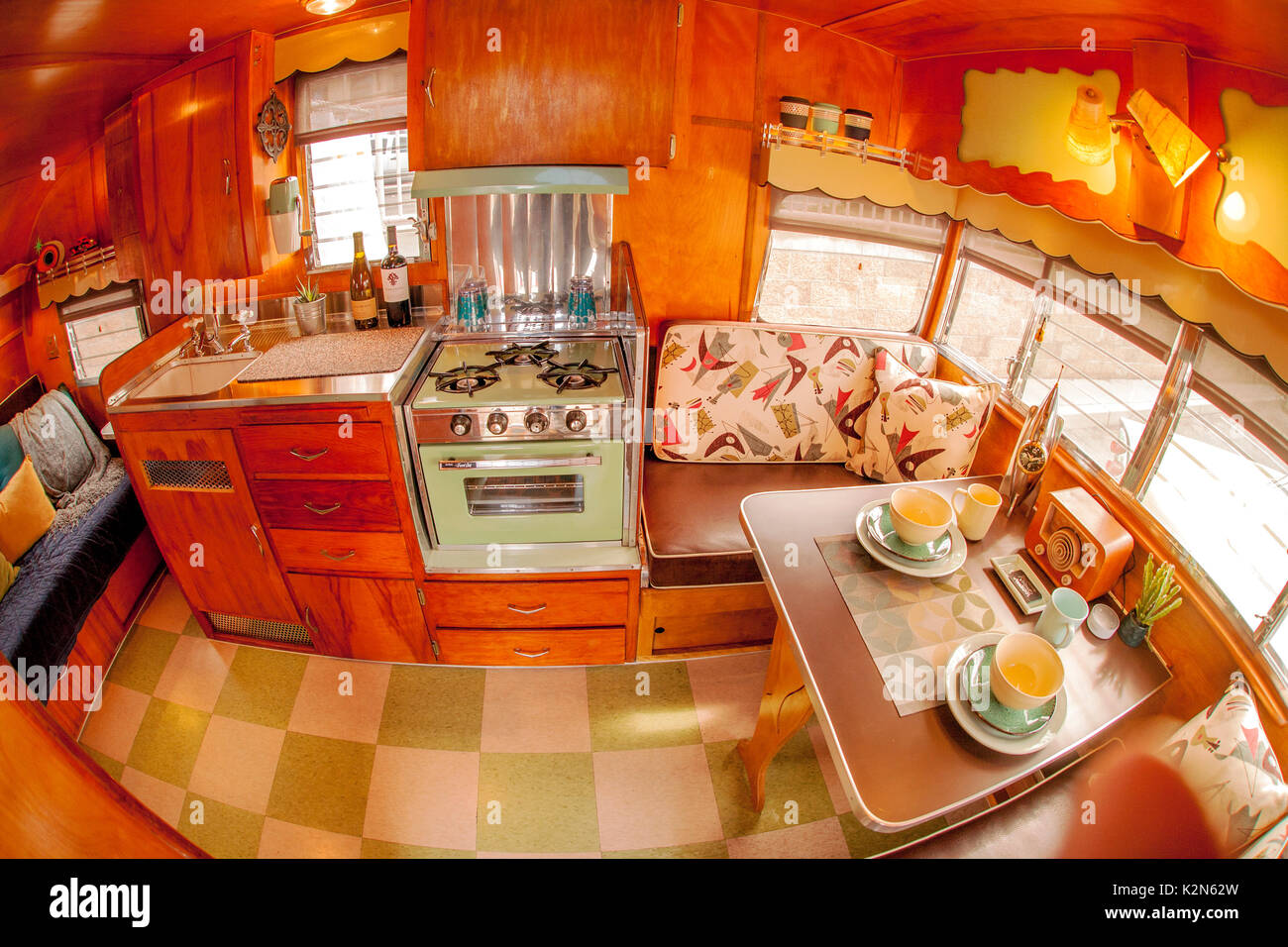The tiny wood paneled interior of a classic 1962 Shasta Airflyte ...
