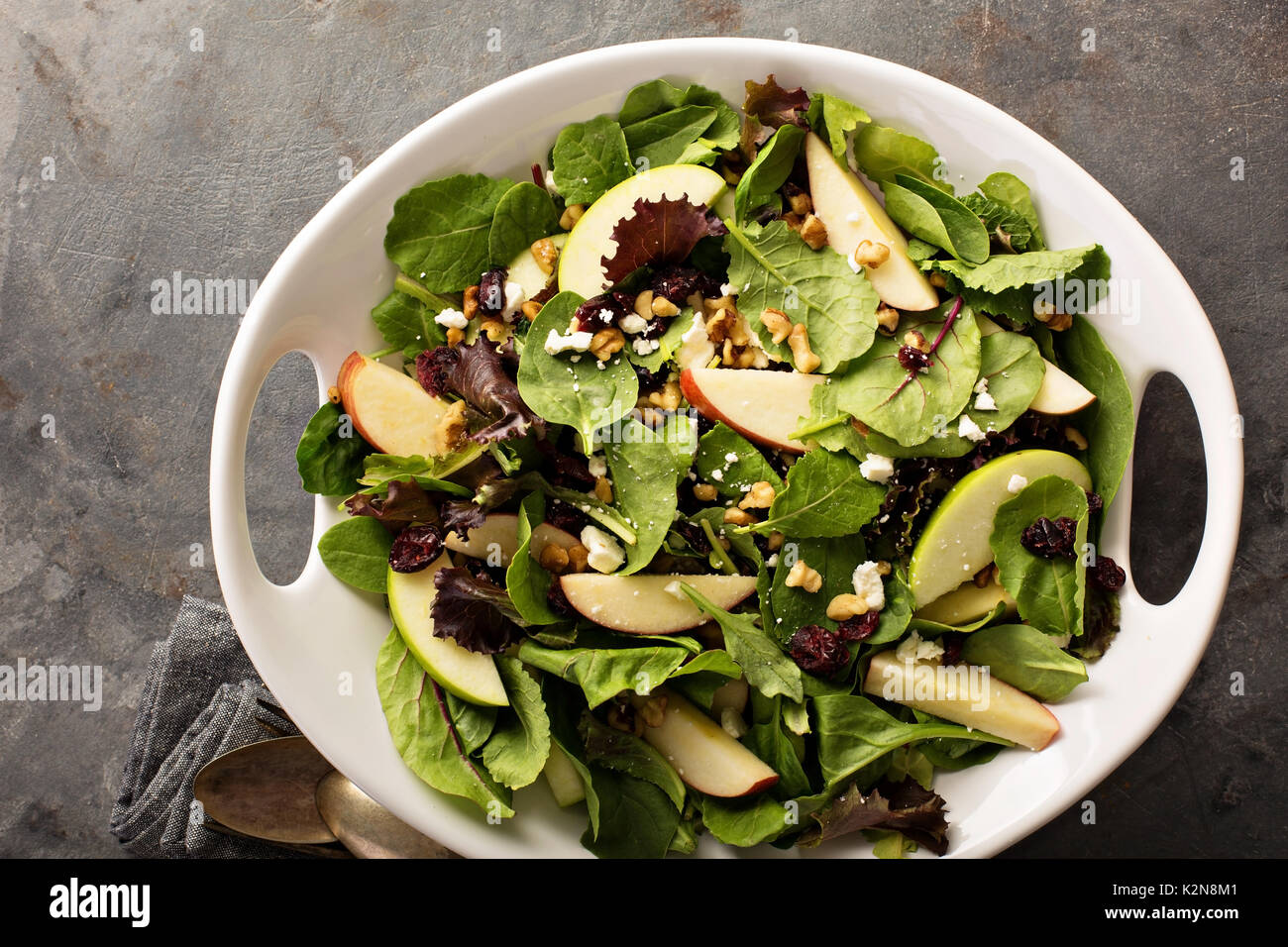 Fall salad with spring mix, apple, nuts and cranberry Stock Photo - Alamy