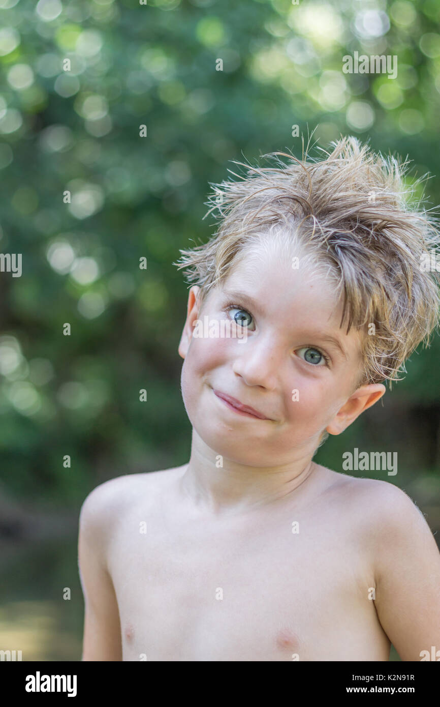 Portrait of a boy with blurred background Stock Photo - Alamy