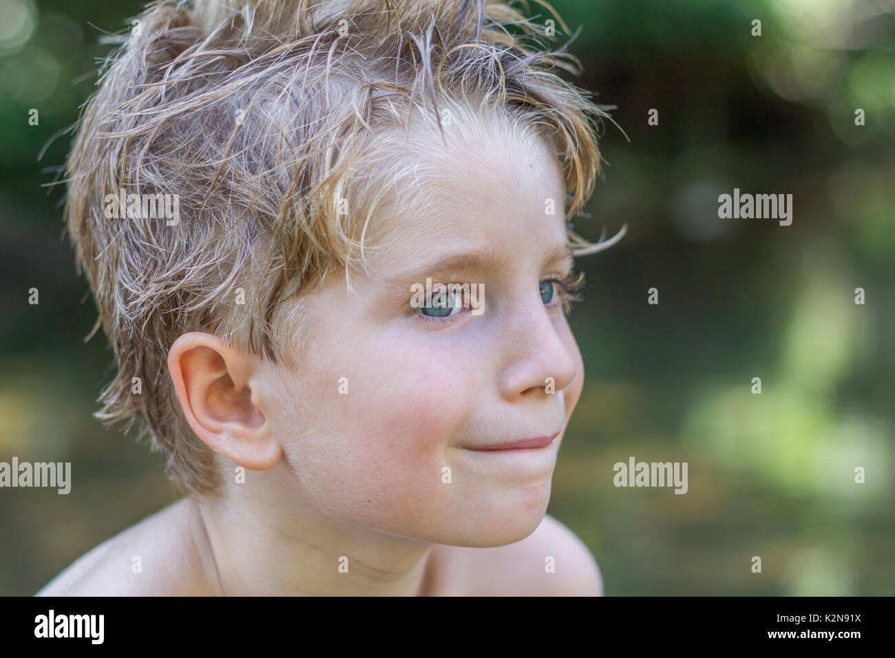Portrait of a boy with blurred background Stock Photo - Alamy