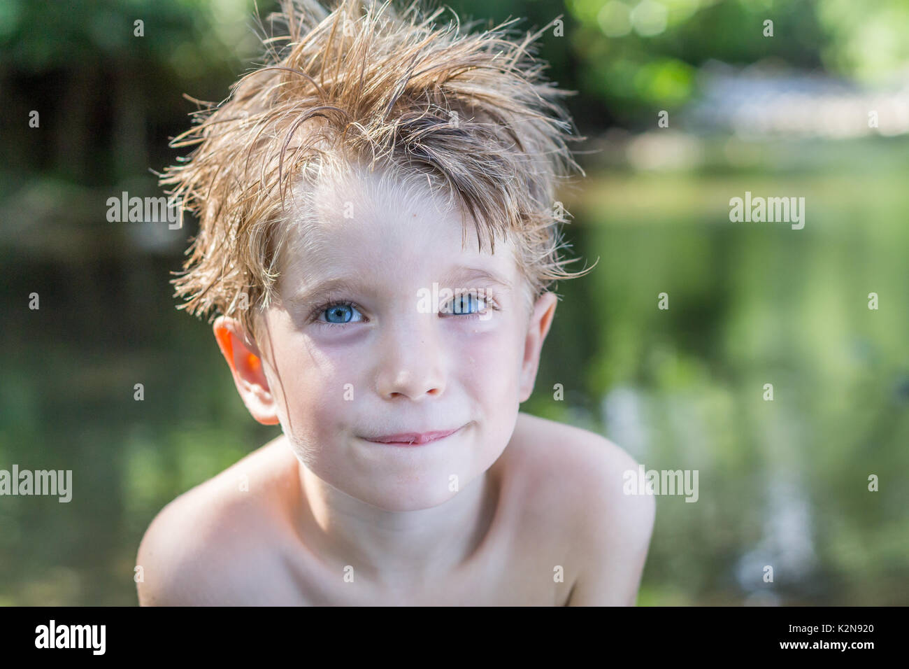 Portrait of a boy with blurred background Stock Photo - Alamy