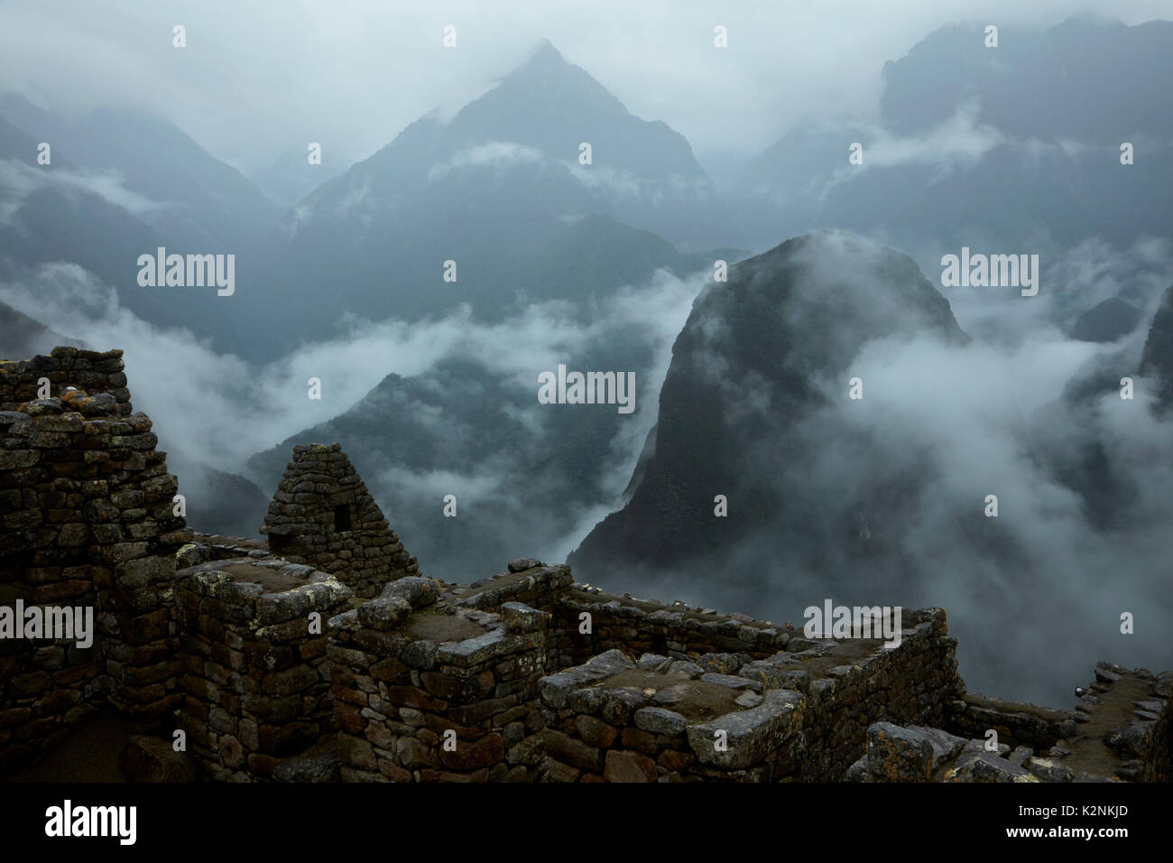 Stone houses and misty mountains, Machu Picchu (World Heritage Site ...