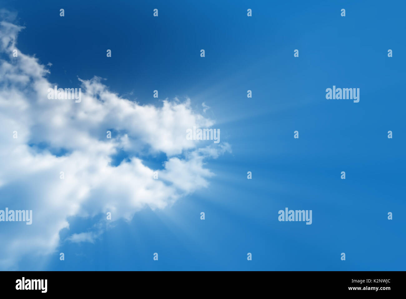 A bright white cloud from which the divine light rays flows in a clear ...