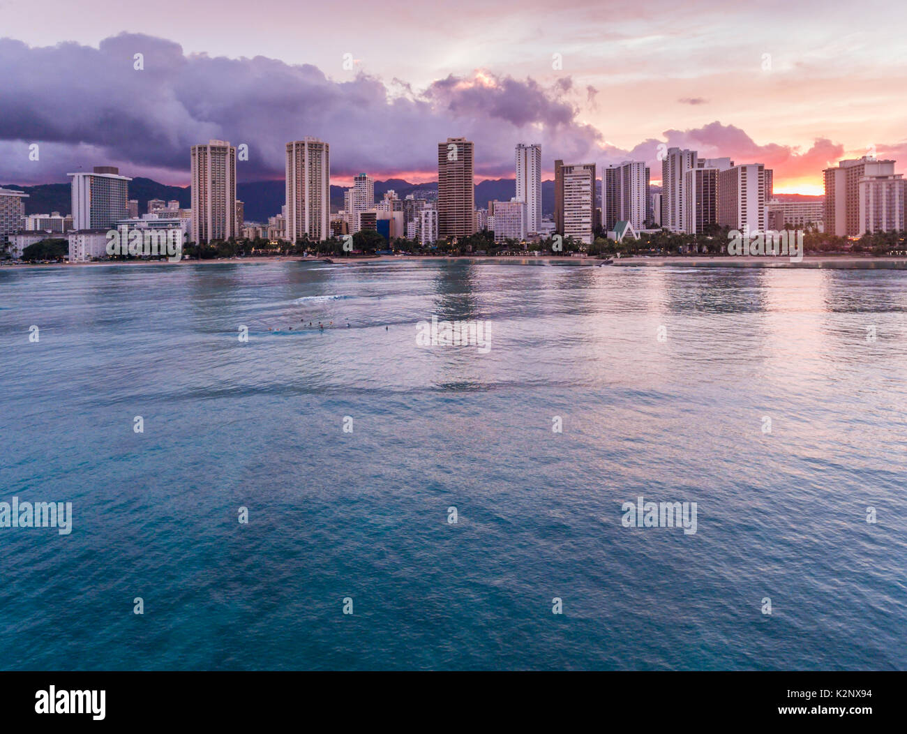 Aerial view of the Waikiki skyline, Ocean and Beach during sunrise ...