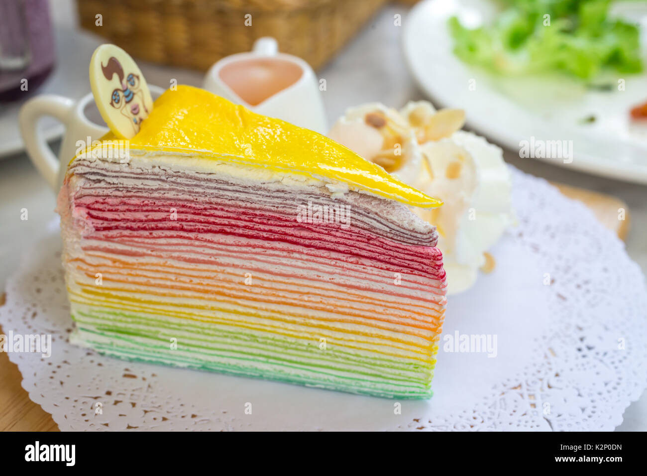 rainbow crape cake with raspberry jam or strawberry jam Stock Photo - Alamy