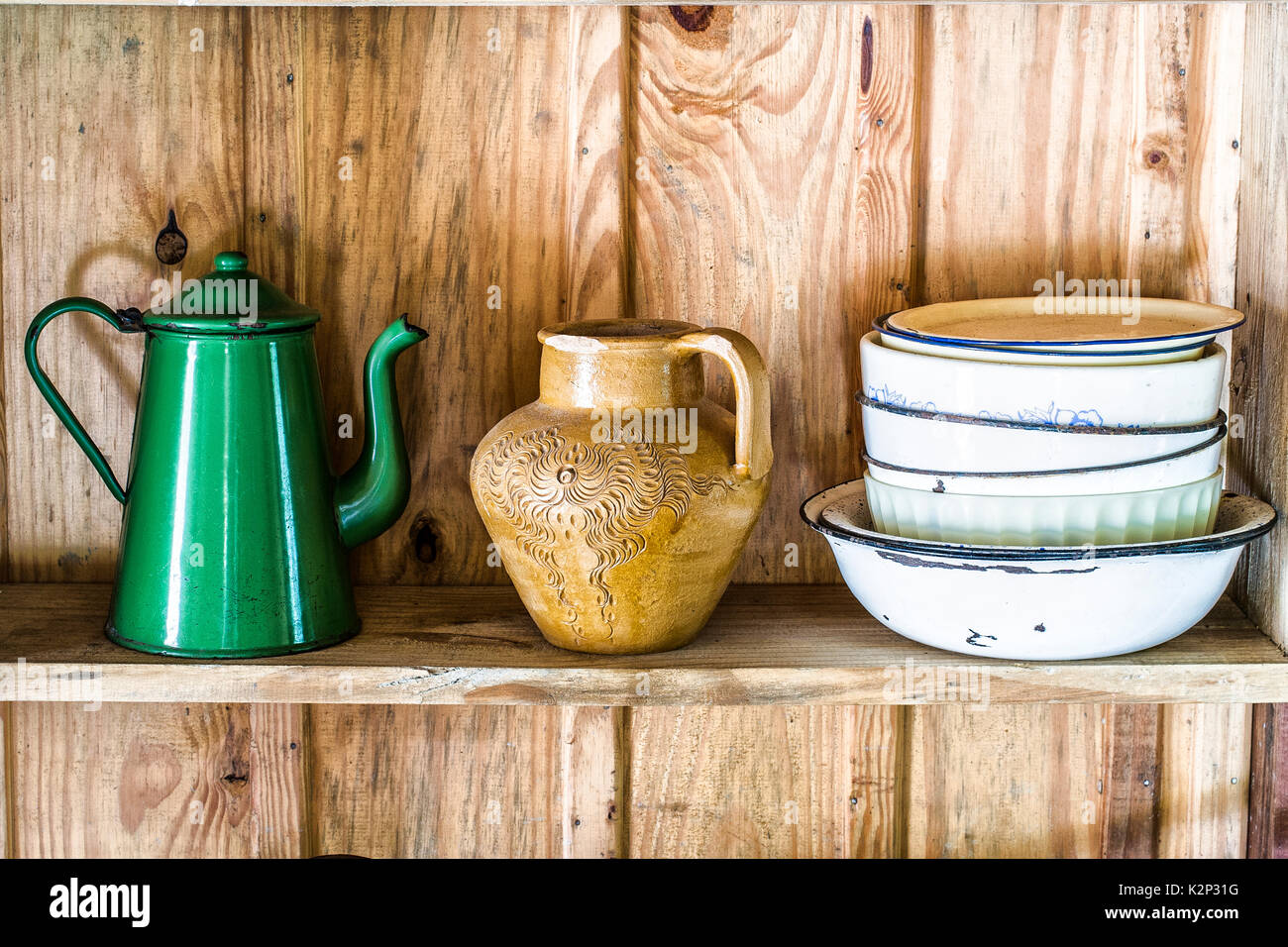 Old kitchen artifacts on a wood shelf in the Colonial Museum. Nova ...