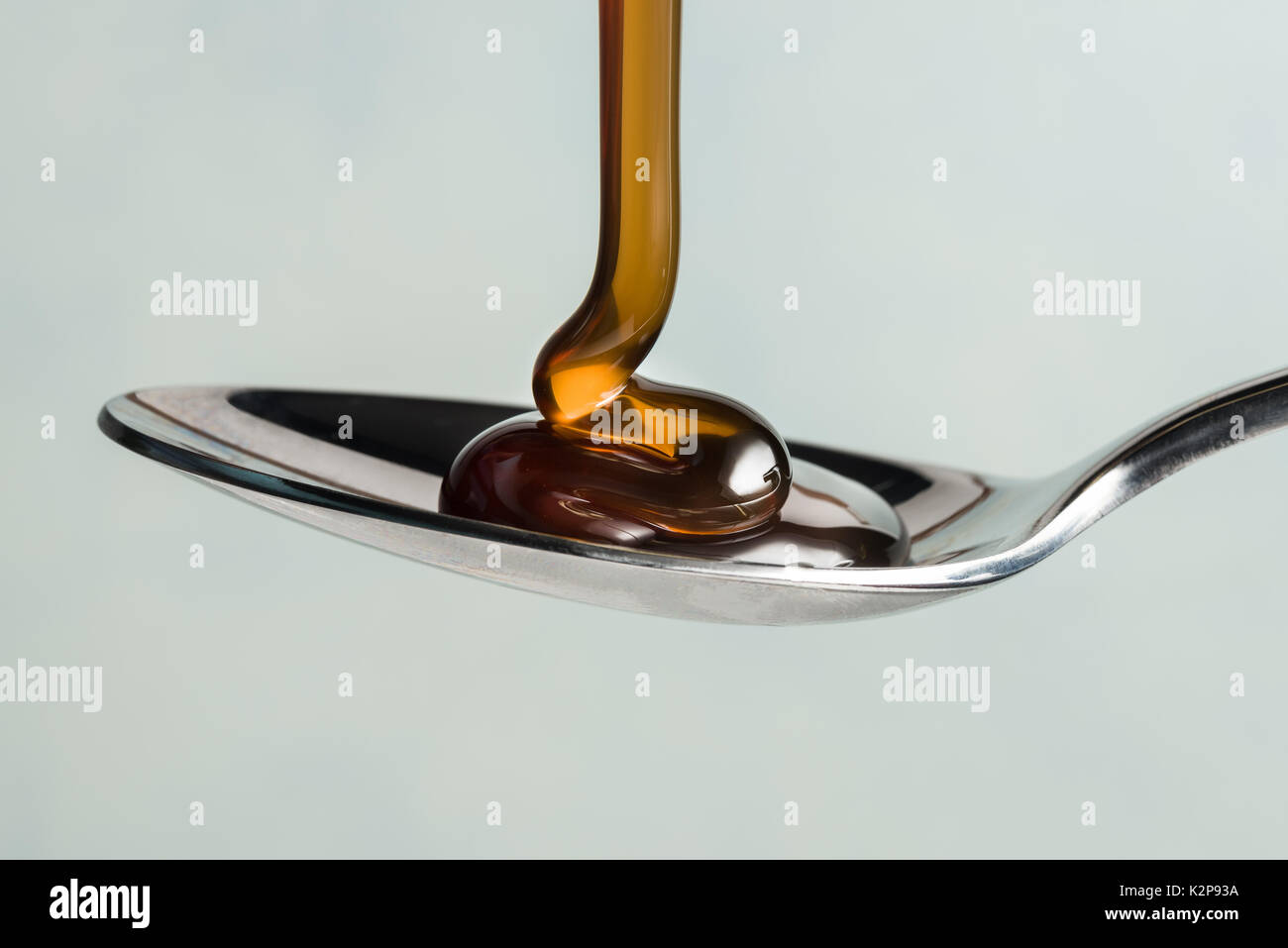 Dark Corn Syrup in Motion Stock Photo - Alamy