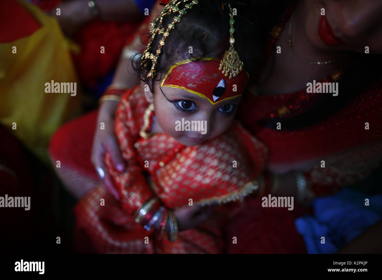 Kathmandu, Nepal. 31st Aug, 2017. A young girl dressed as the Living ...