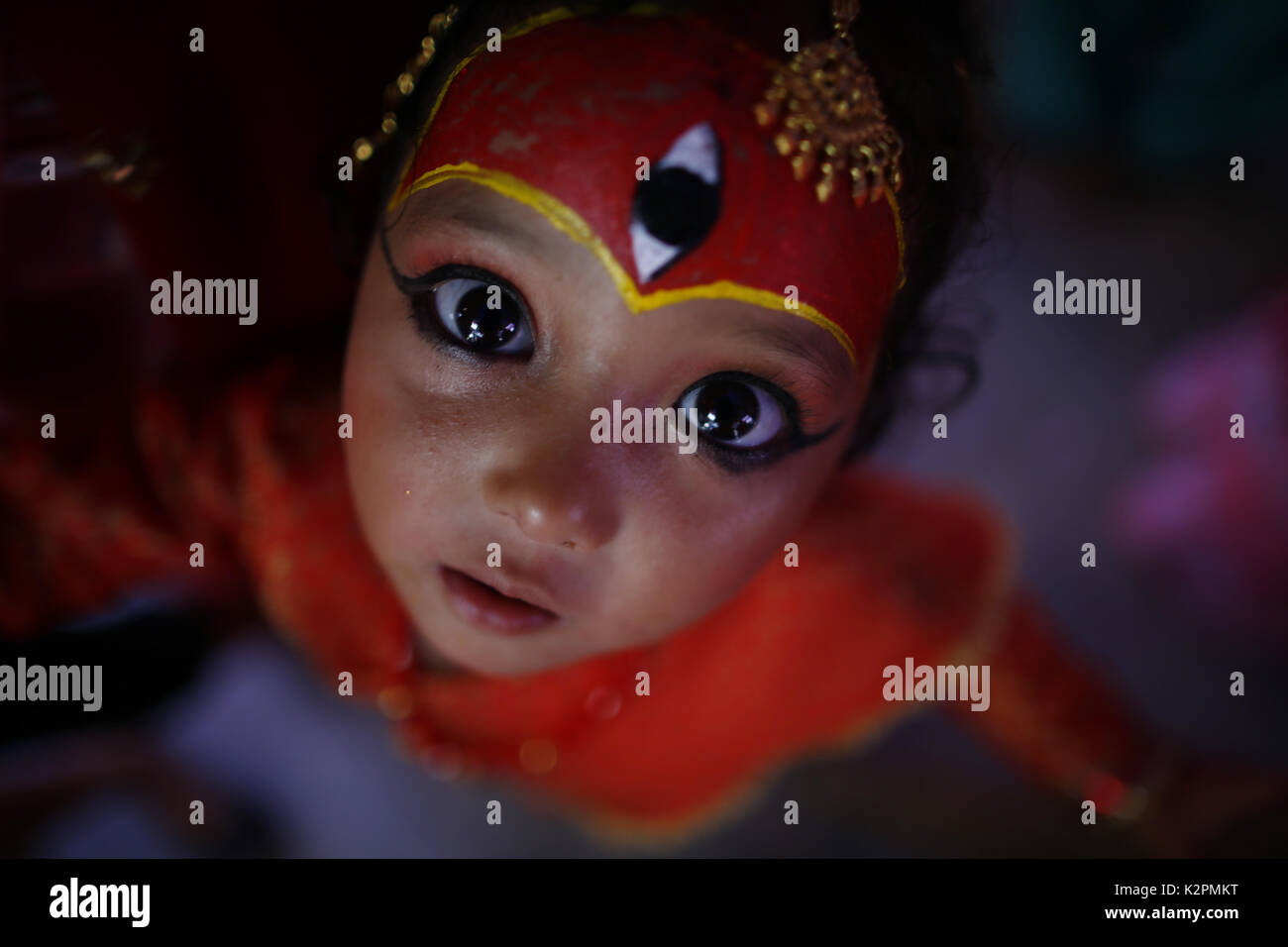 Kathmandu, Nepal. 31st Aug, 2017. A young girl dressed as the Living ...