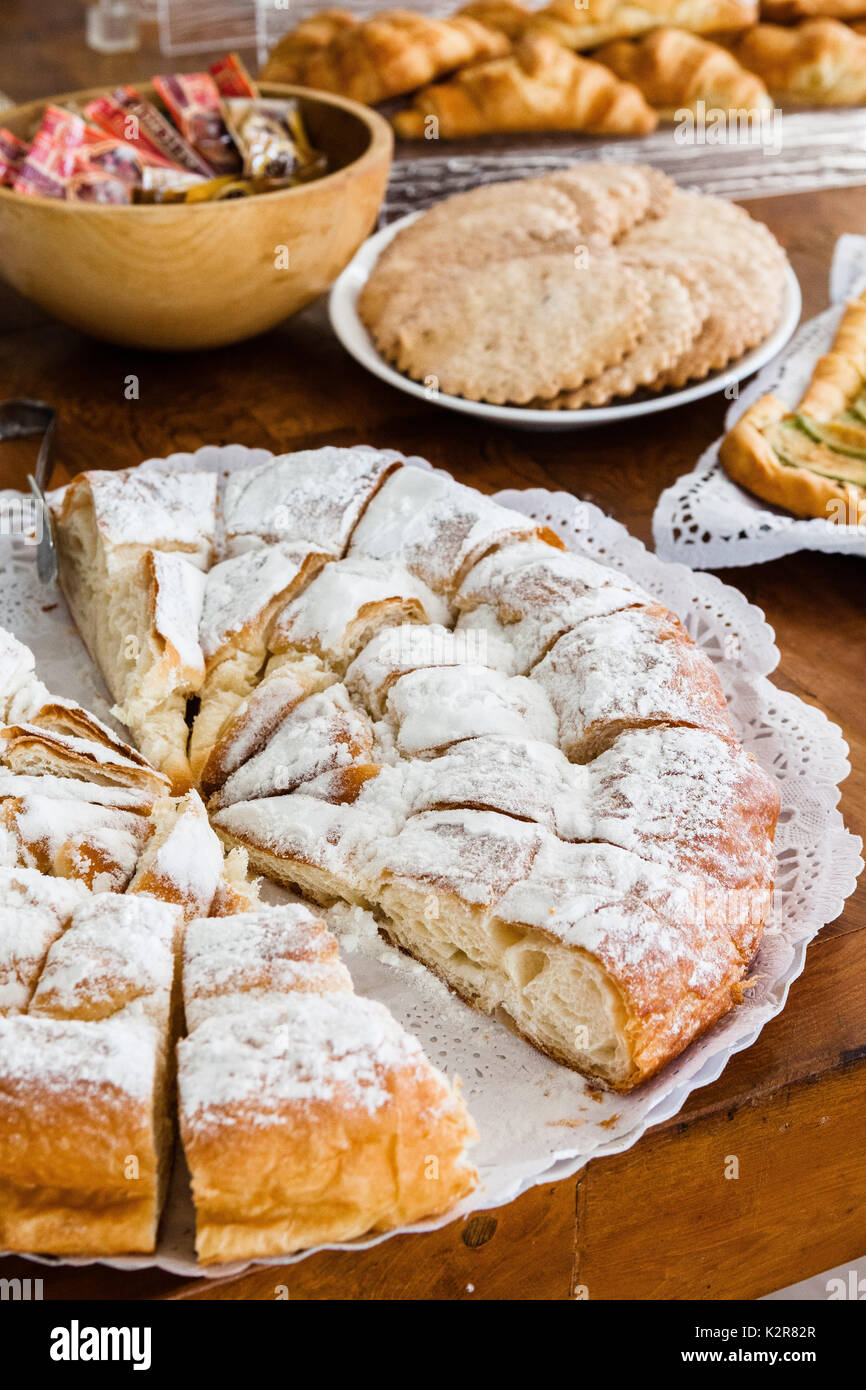 Typical sweets from Menorca. Enseimadas and cookies Stock Photo - Alamy