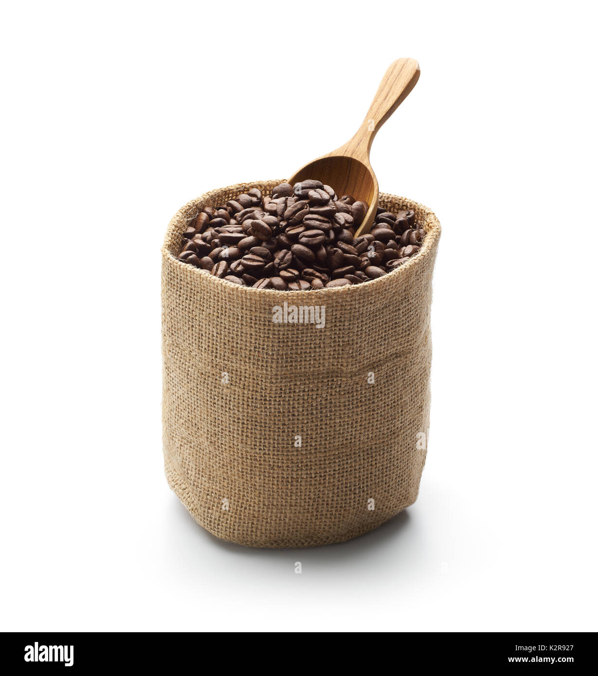 Coffee beans, burlap sack and wooden scoop isolated on white background ...