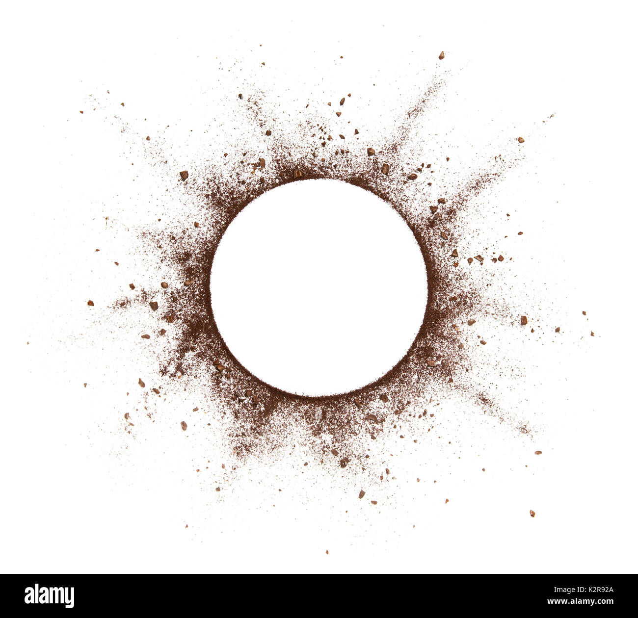 Coffee powder splash isolated on white background Stock Photo - Alamy