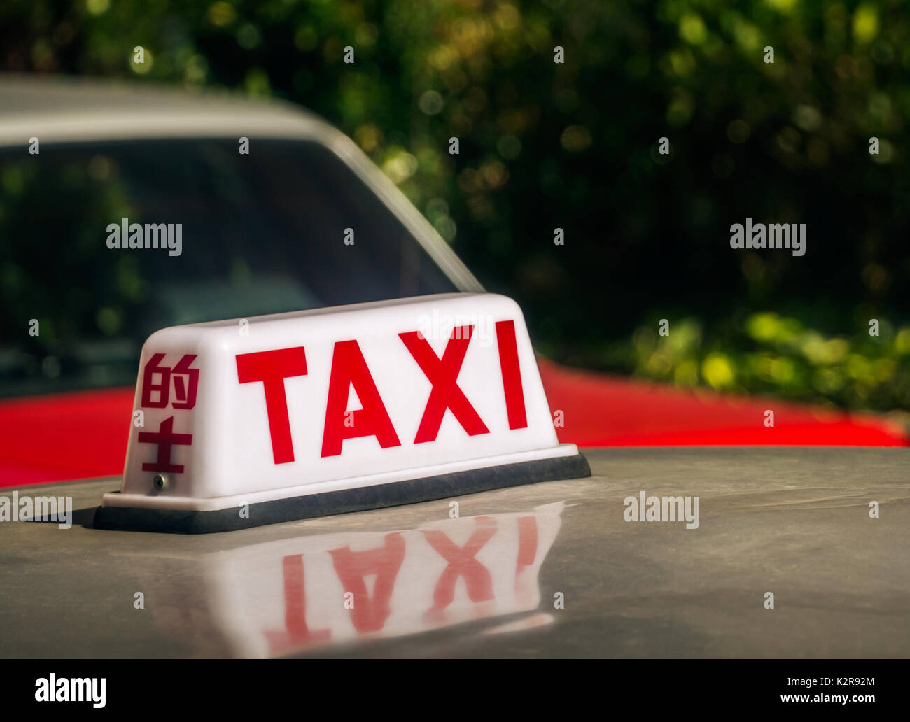 Red taxi hi-res stock photography and images - Alamy