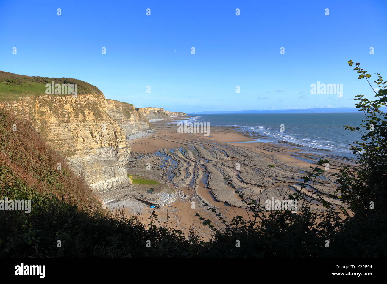 Facing south looking along a line of cliffs with many bays and beaches ...