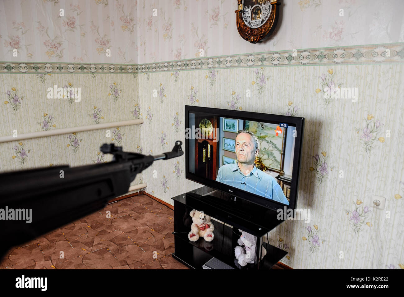 Krasnodar, Russia - July 28, 2017: A pneumatic gun aimed at the TV. The ...