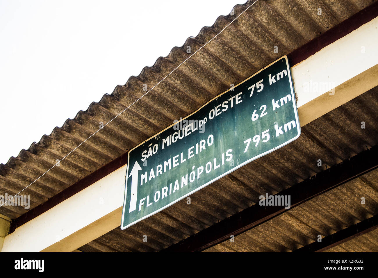 Sign with distances to cities in Santa Catarina state. Dionisio ...
