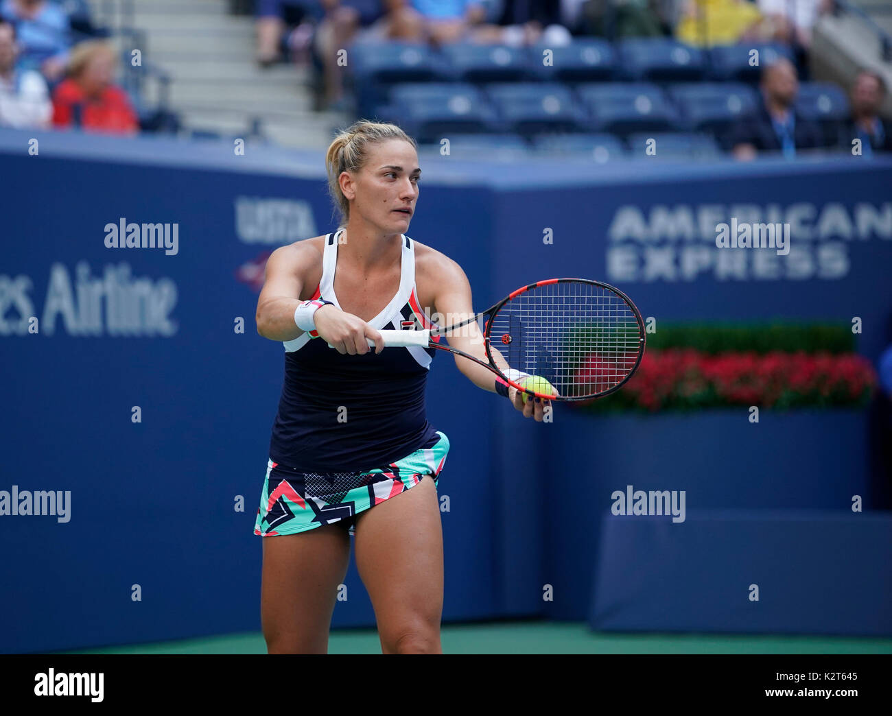 New York, United States. 30th Aug, 2017. Timea Babos of Hungary serves ...