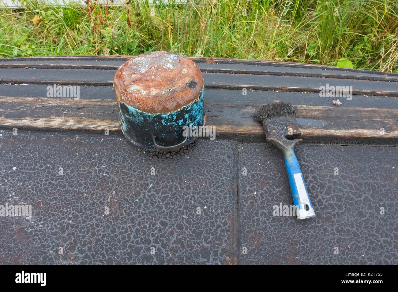 old brush with dried tar on boat Stock Photo - Alamy