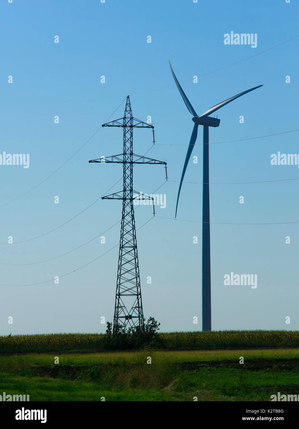 wind turbine and electricity pole for power plant or eco concept Stock ...