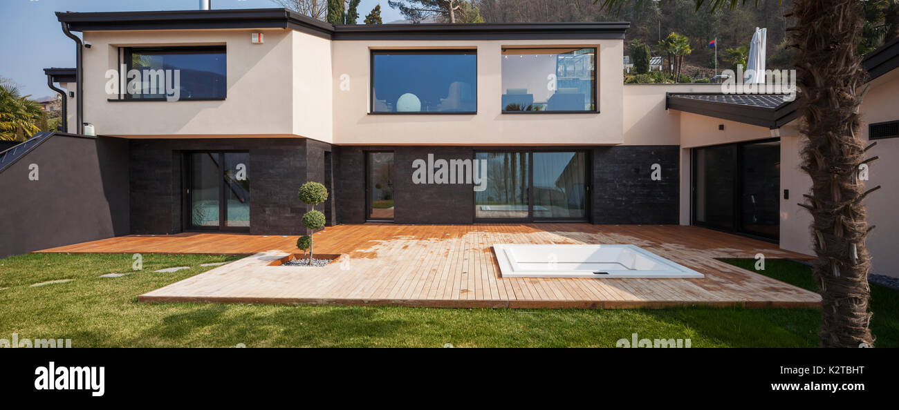 Exterior of a modern villa, veranda with pool Stock Photo - Alamy
