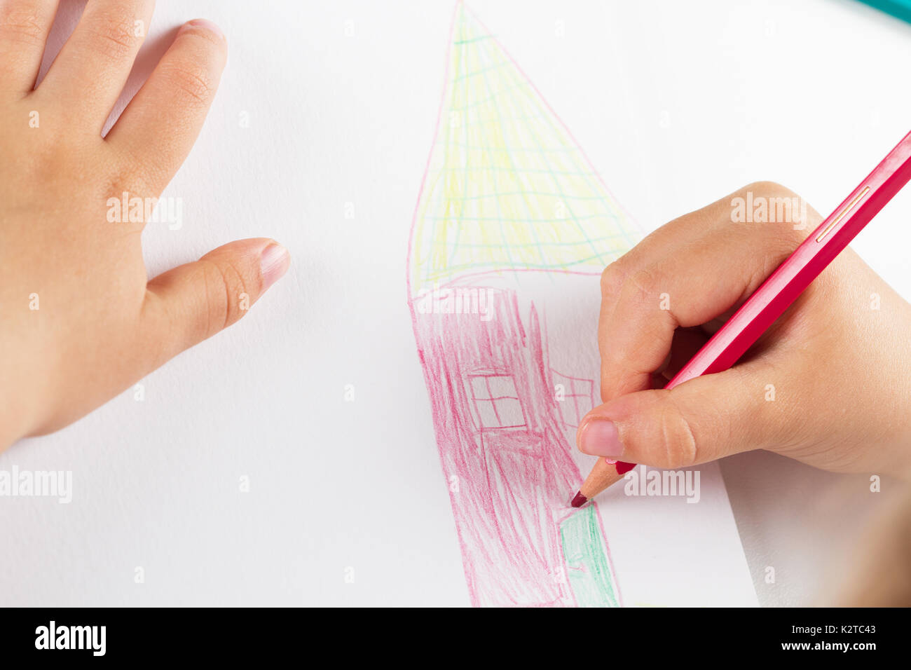 Hand of child drawing by colour pencil Stock Photo - Alamy