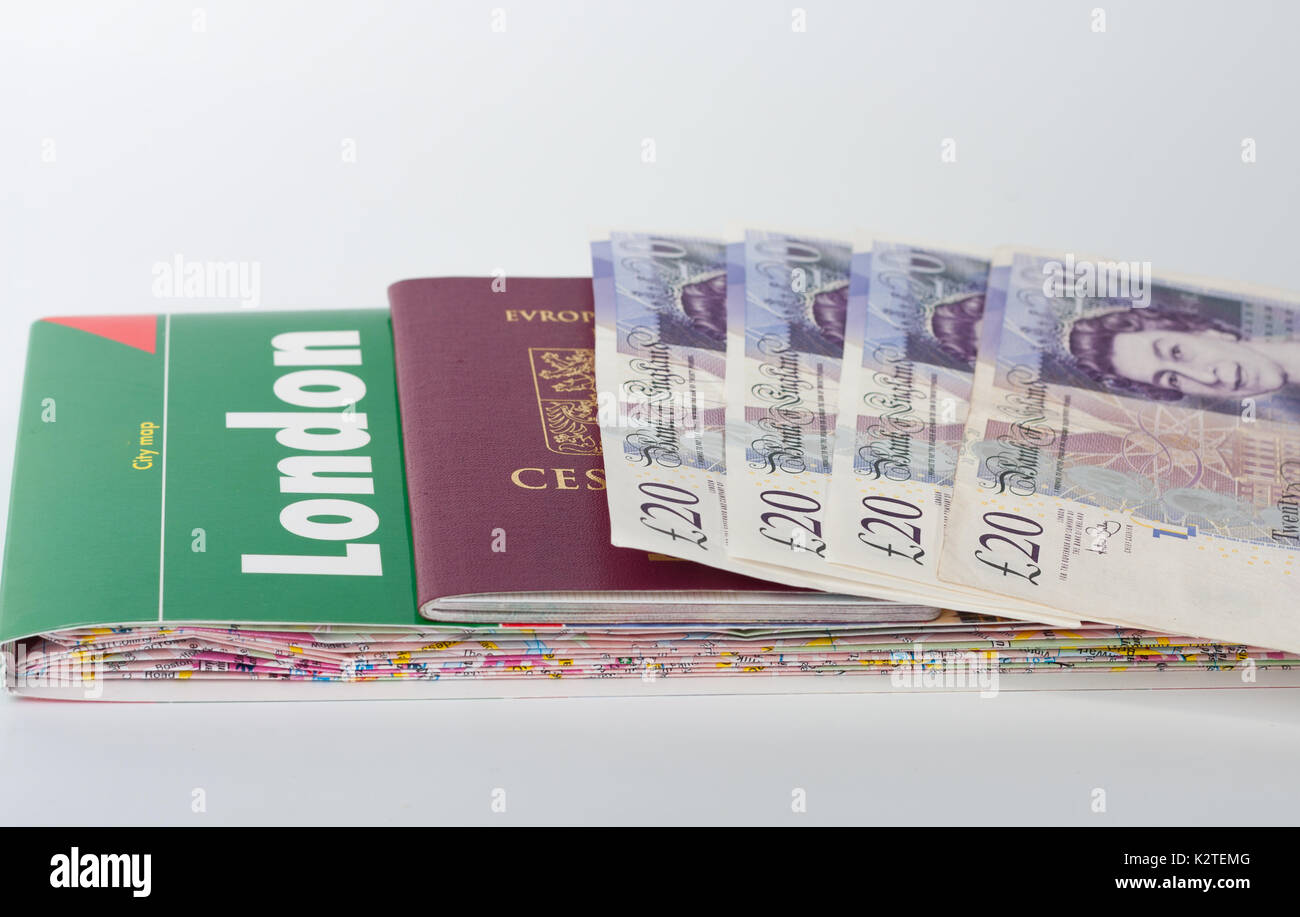 Map of London,passport and british pounds, equipment before traveling ...