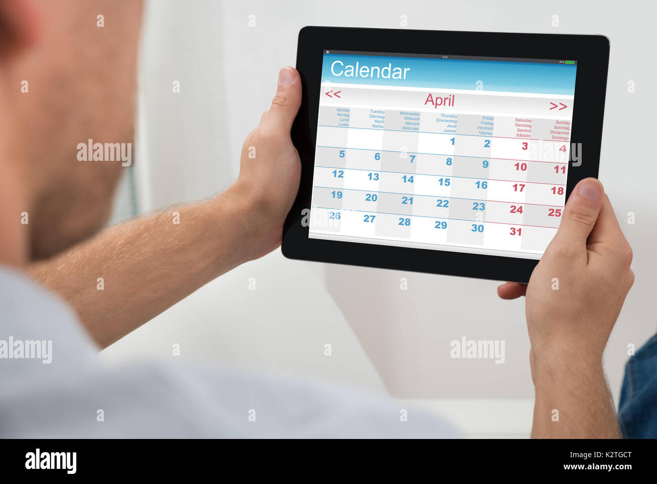 Man showing calendar hi-res stock photography and images - Alamy