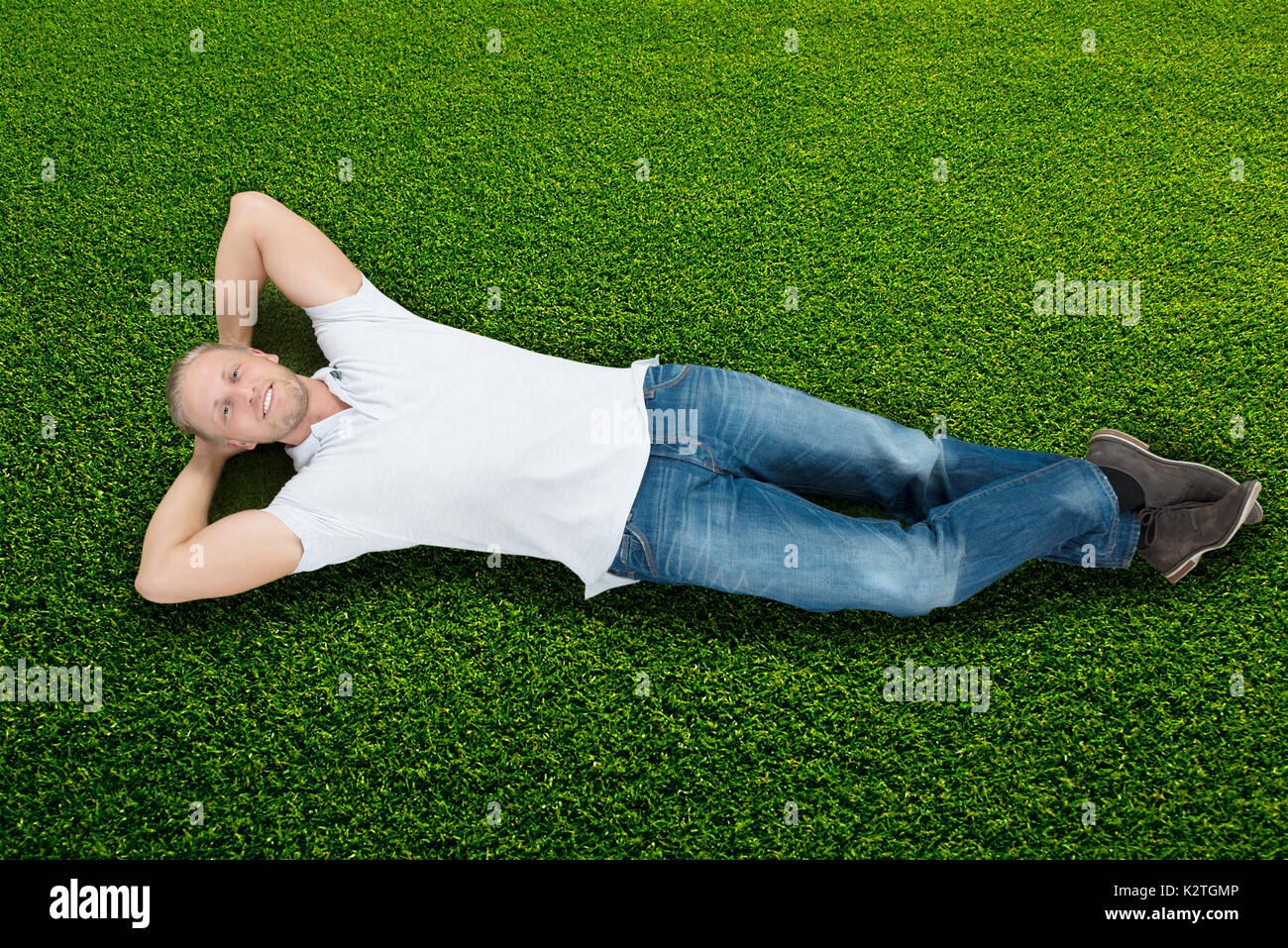 Glad young handsome man hi-res stock photography and images - Alamy