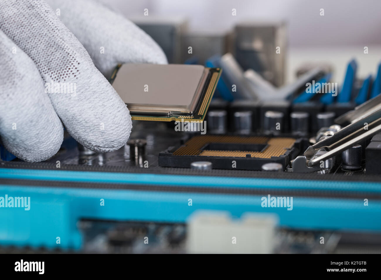 Close-up Of Person Hands Installing Central Processor In Motherboard ...