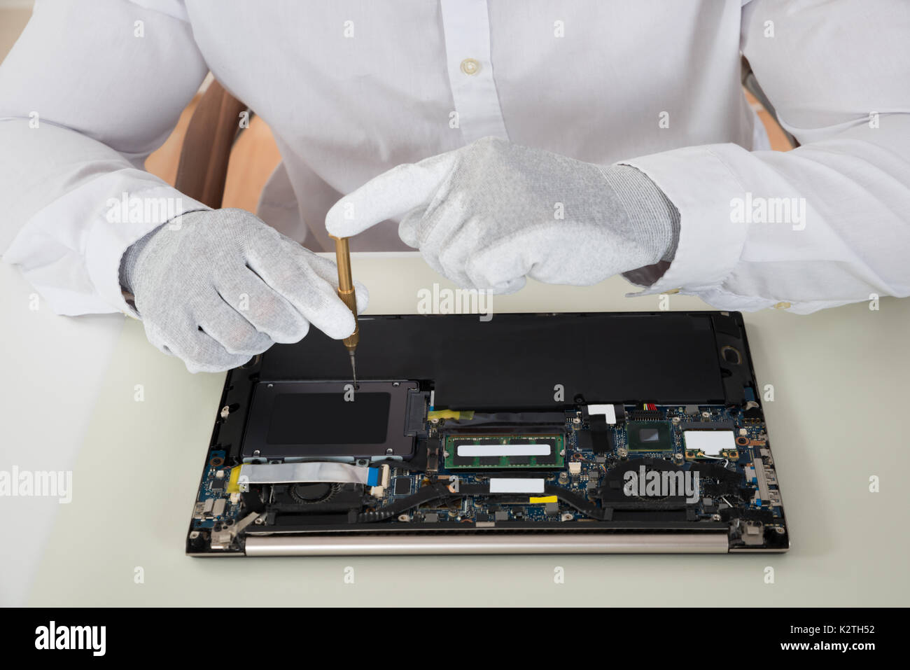 Professional repair modern laptop hi-res stock photography and images ...