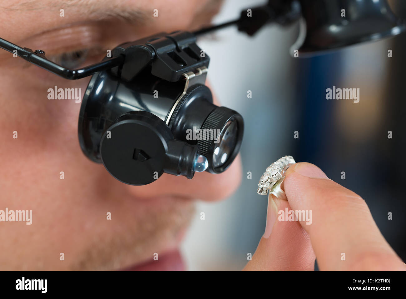 Close-up Of Jeweler Looking Ring Through Magnifying Loupe Stock Photo ...
