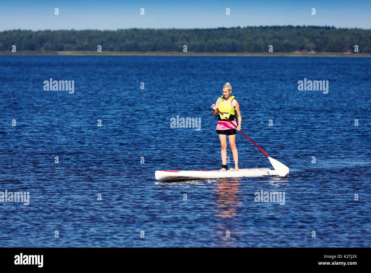 Girl on sup hi-res stock photography and images - Alamy