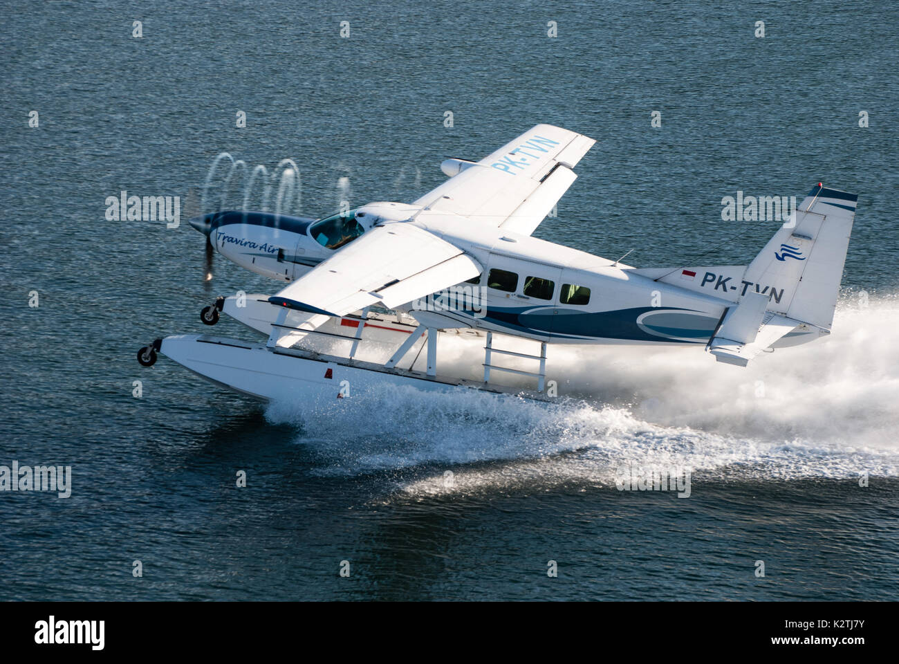 Seaplane Taking Off from Benete Bay, Java, Indonesia Stock Photo - Alamy
