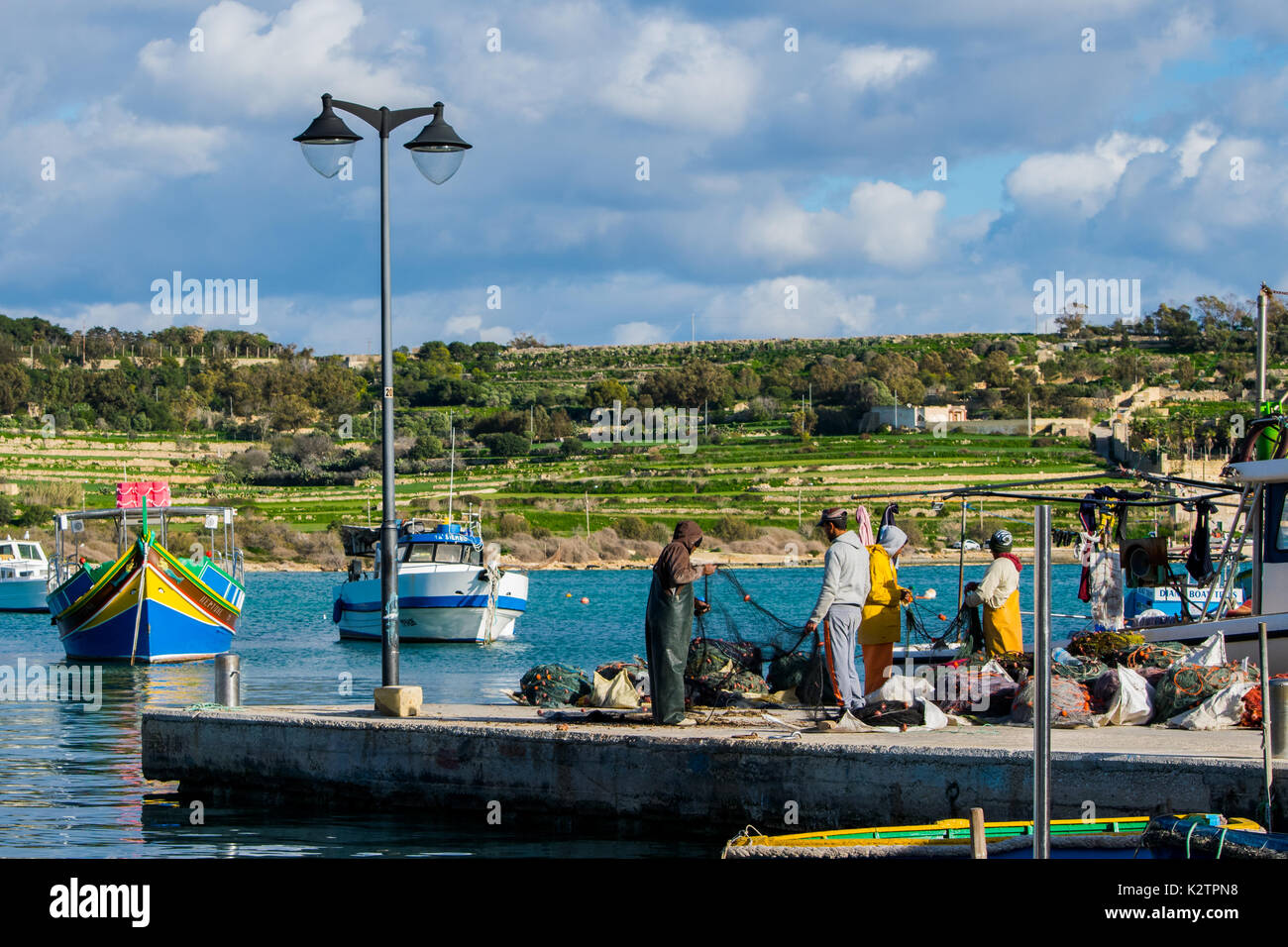 Fisherman Sorting Out Catch High Resolution Stock Photography and ...