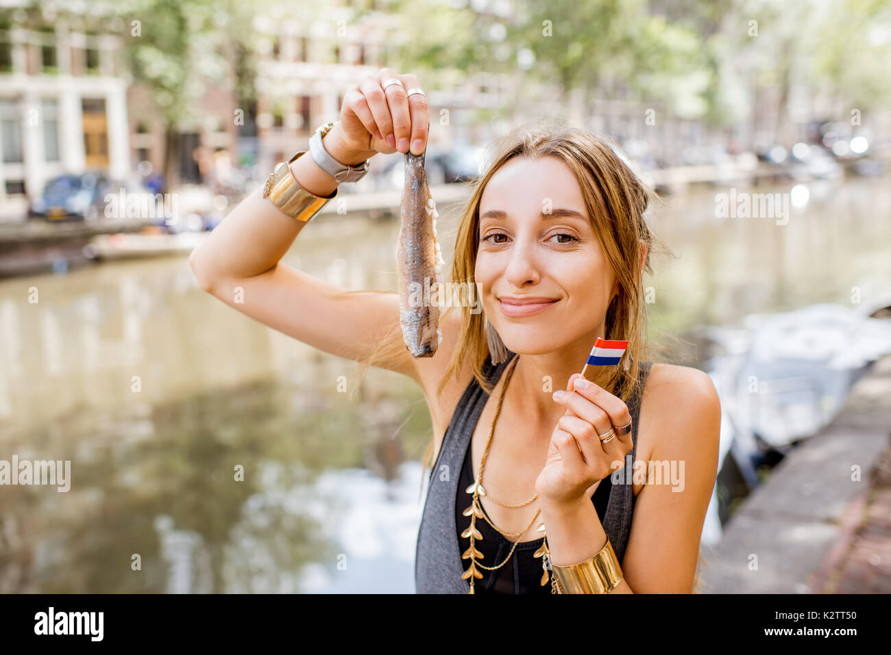 Woman with harring in Amsterdam Stock Photo - Alamy