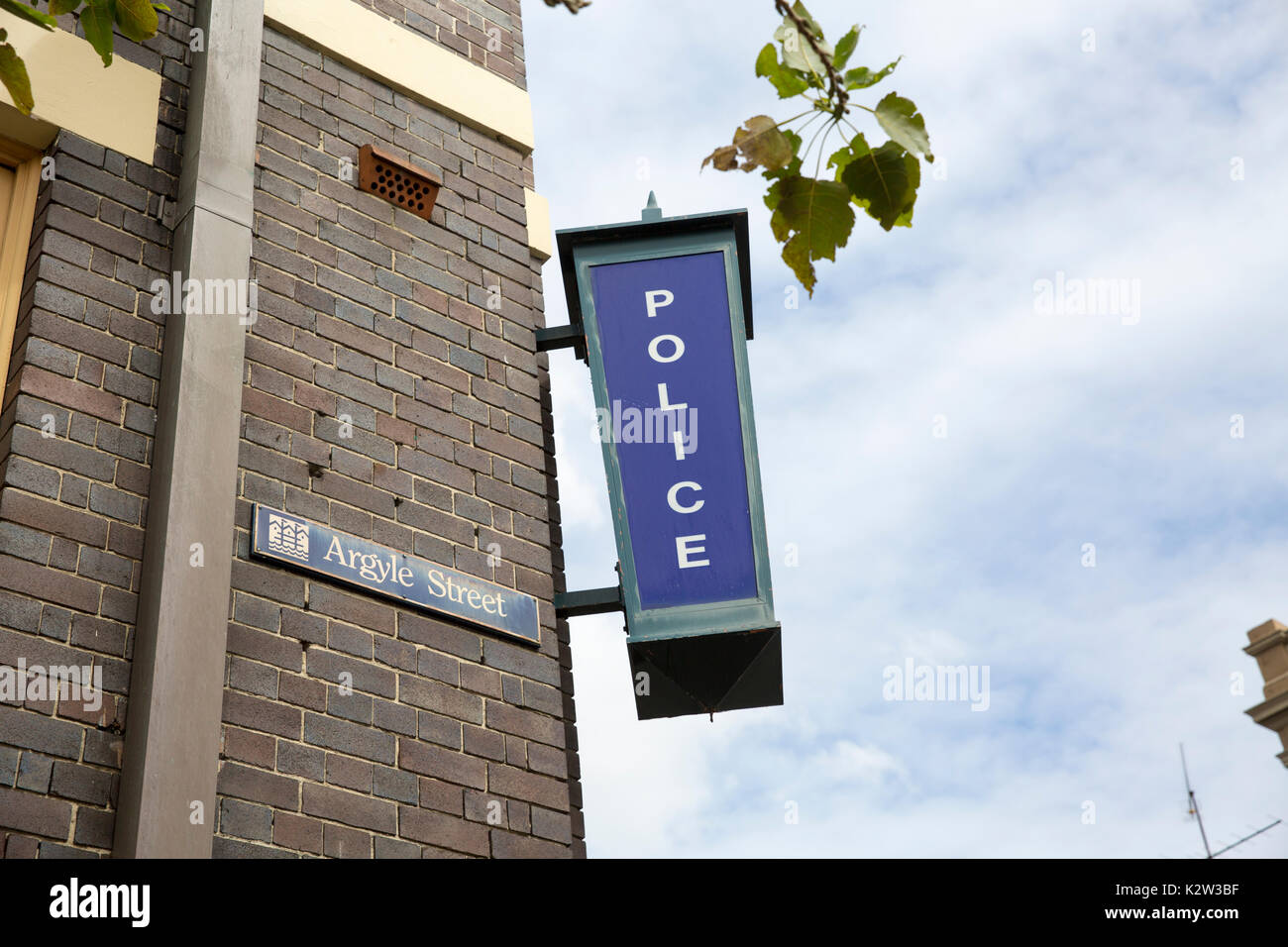 Traditional blue lamp Police station sign in The Rocks, historic area ...
