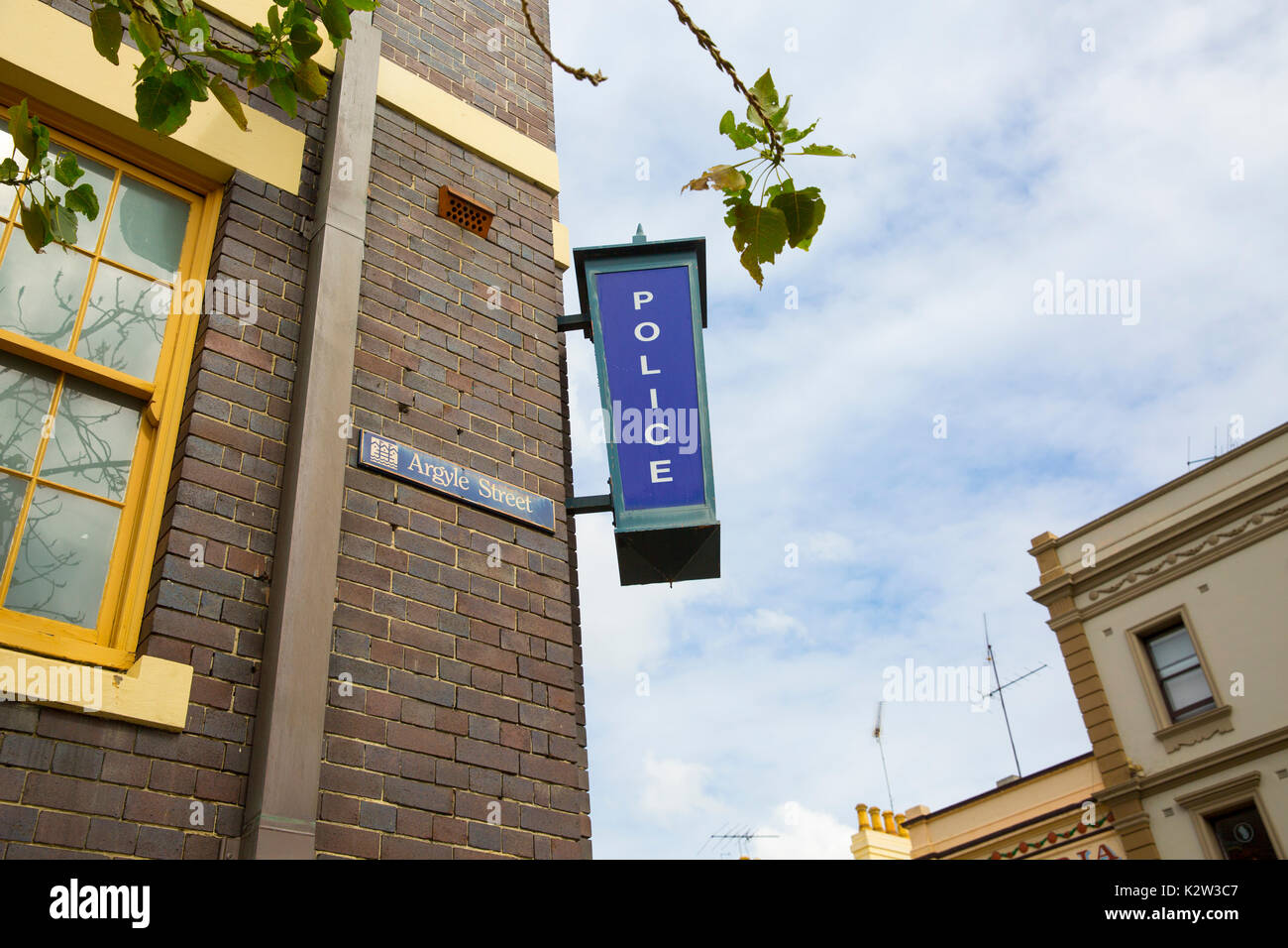 Traditional blue lamp Police station sign in The Rocks, historic area ...