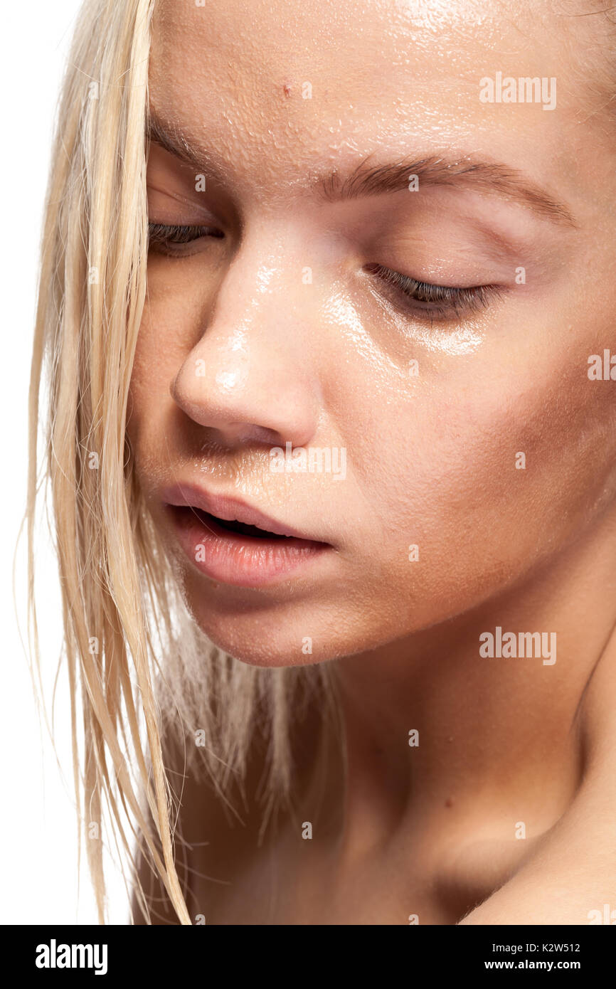 Gorgeous woman with wet face. Studio photo. Beauty and skin care Stock ...