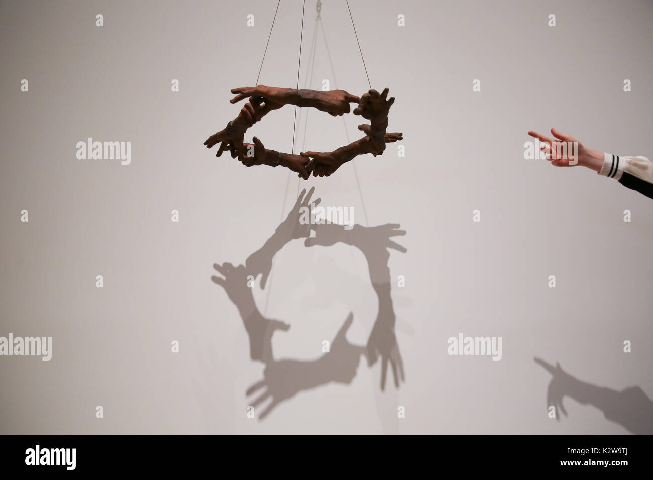 Bright neon sculptures including Violins Violence Silence and Run from ...