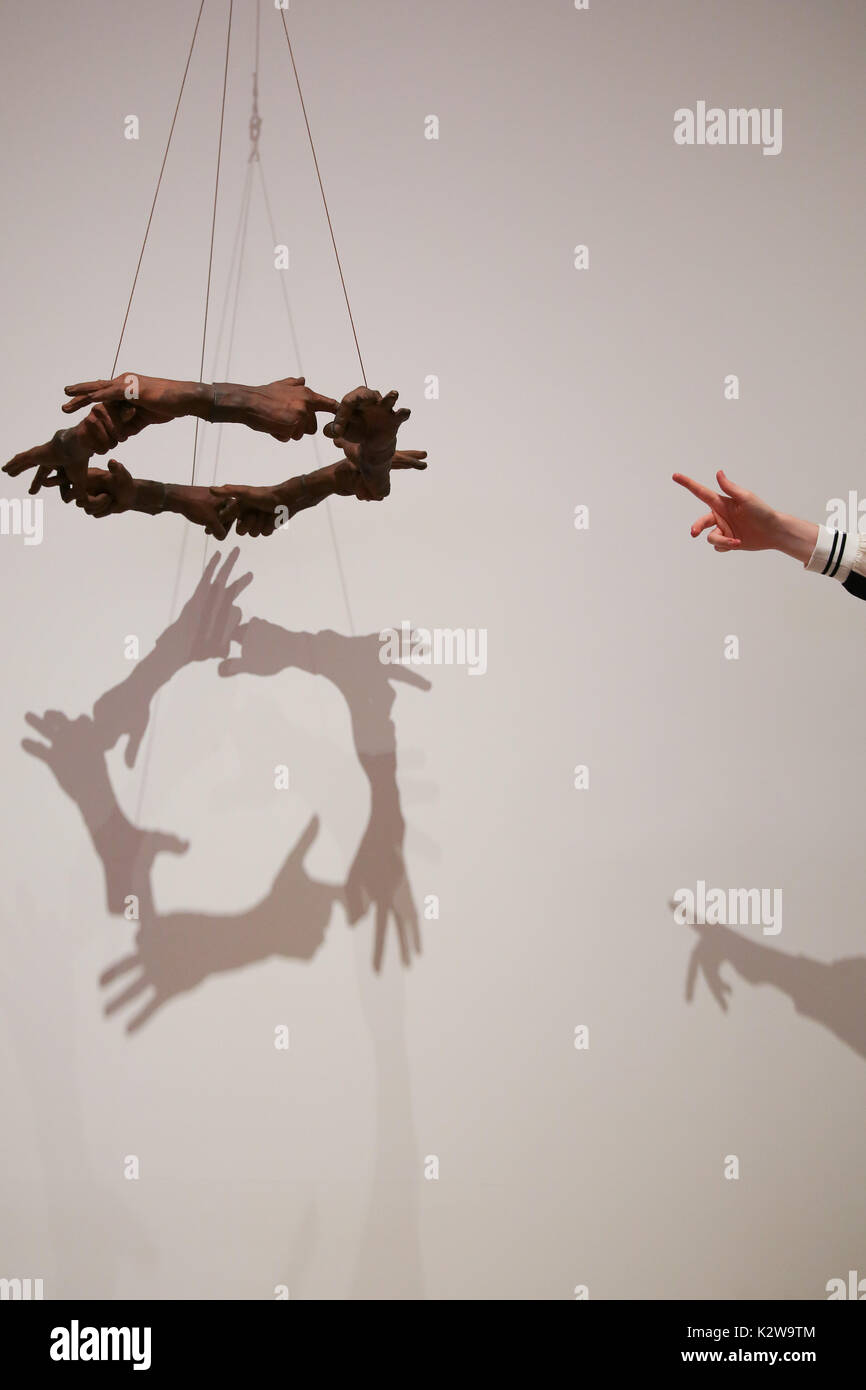 Bright neon sculptures including Violins Violence Silence and Run from ...