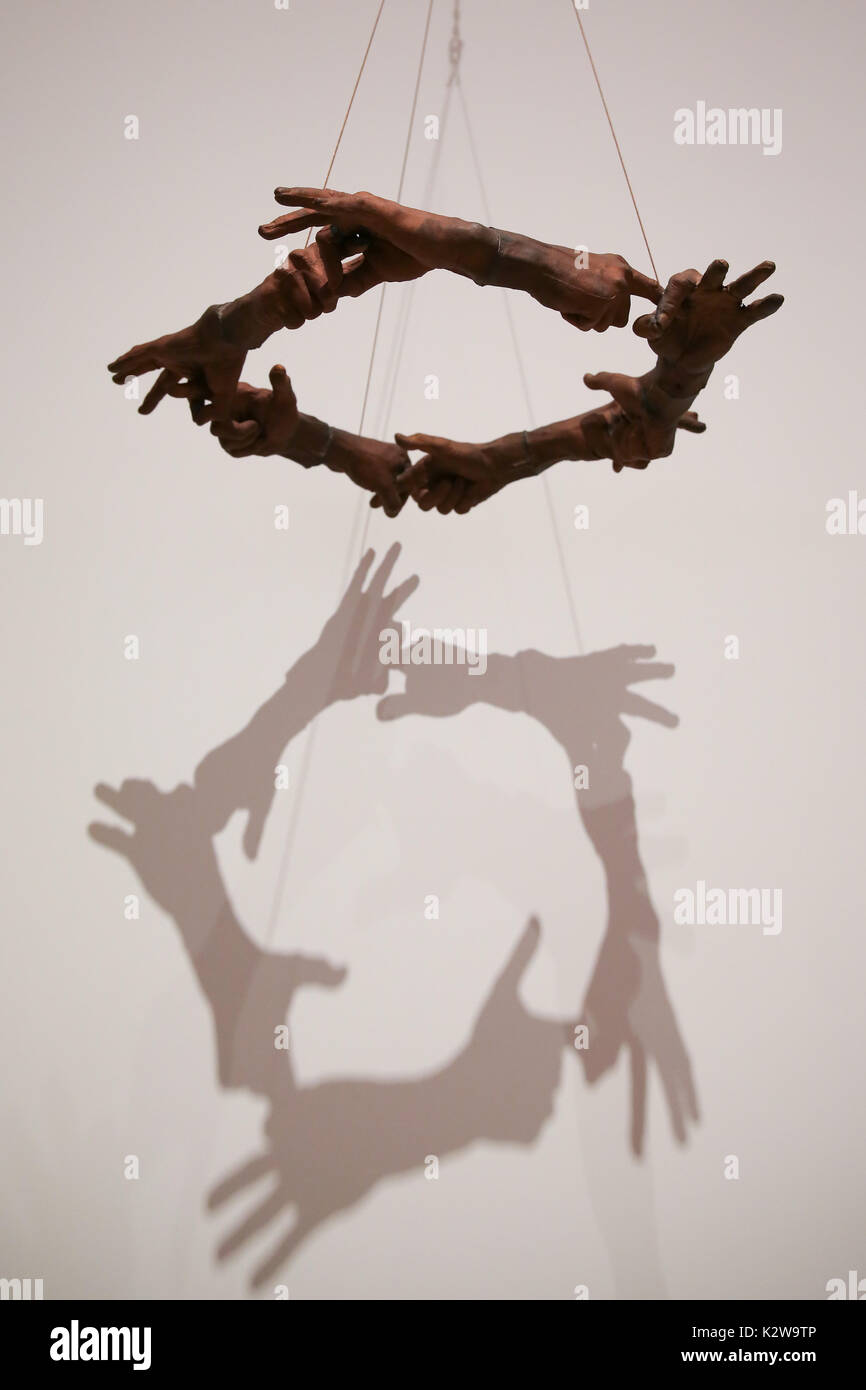 Bright neon sculptures including Violins Violence Silence and Run from ...