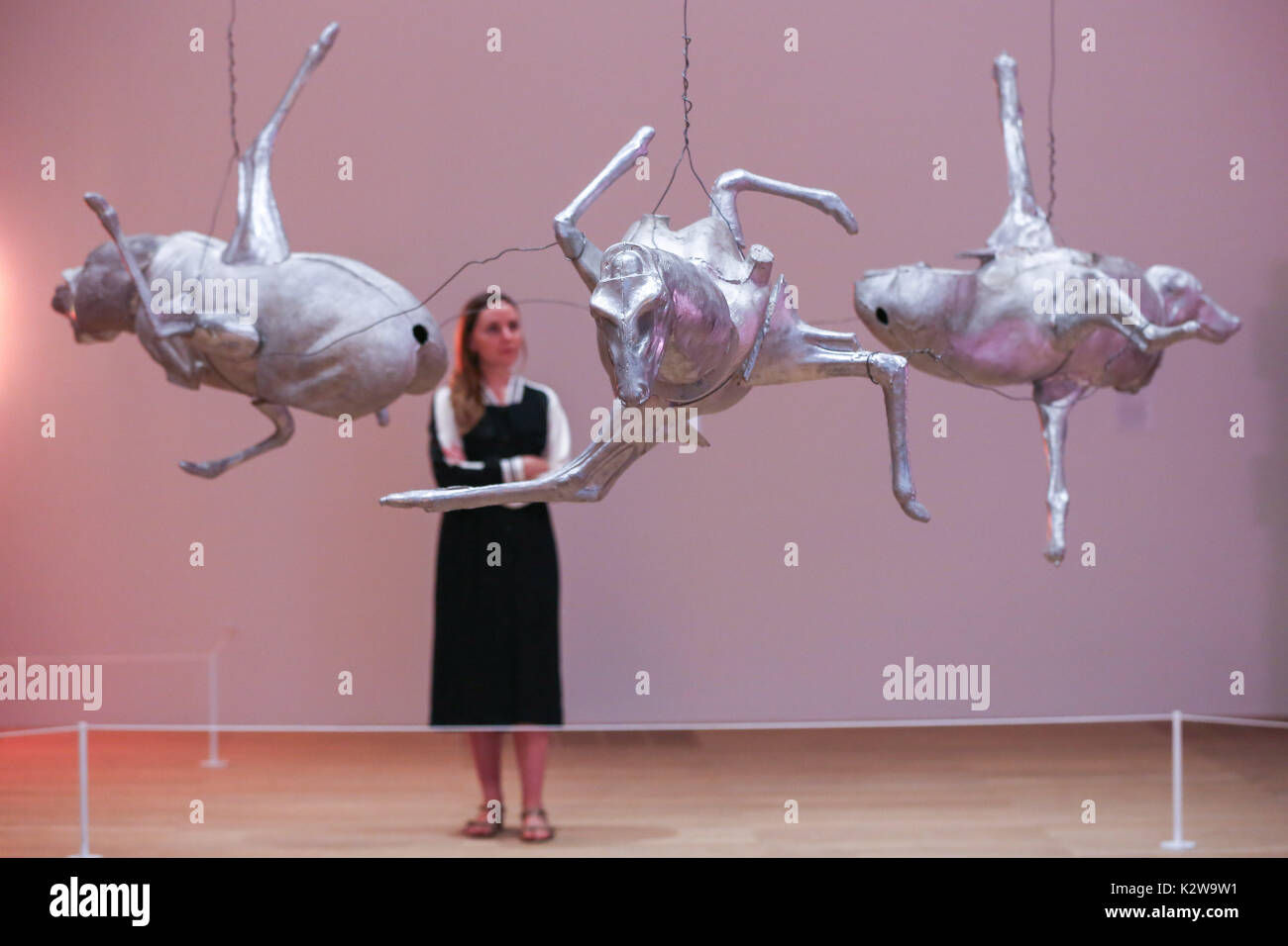 Bright neon sculptures including Violins Violence Silence and Run from ...