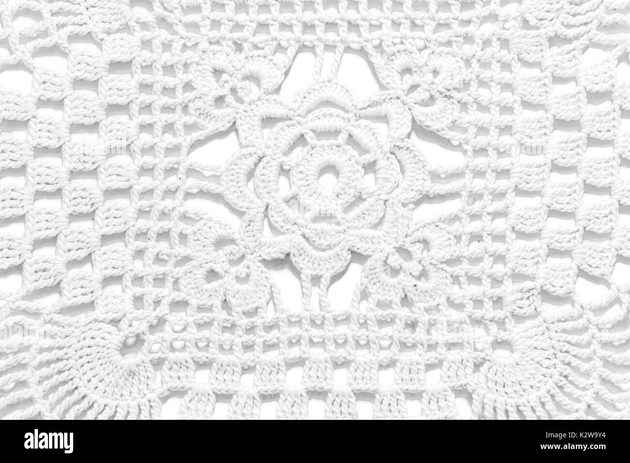 White handmade lace tablecloth texture on white background Stock Photo ...