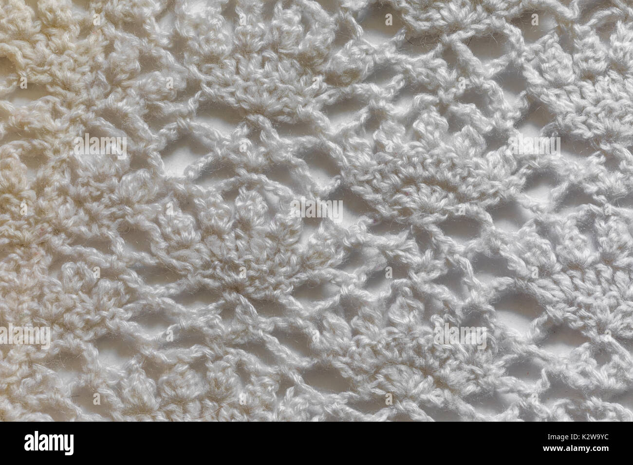 White handmade lace tablecloth texture on white background Stock Photo ...